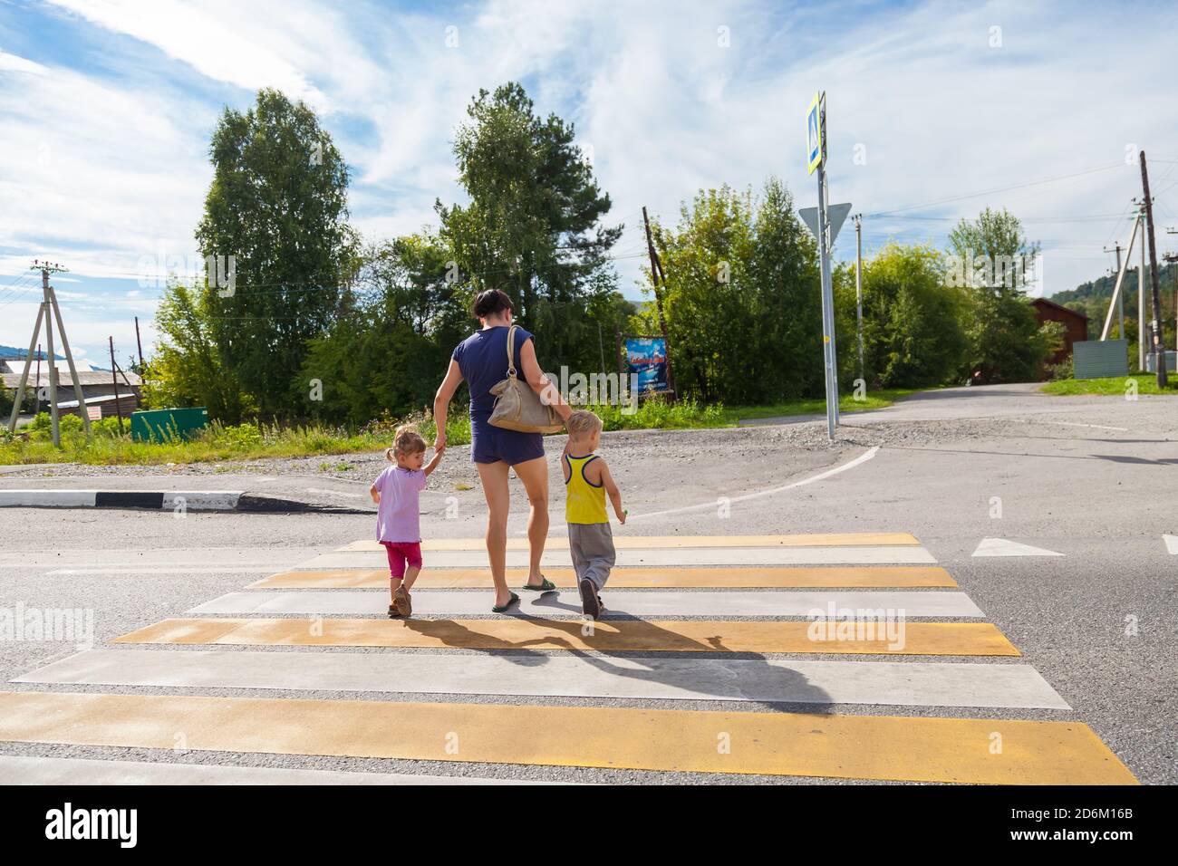 Mother and daughter crossing road hi-res stock photography and images ...