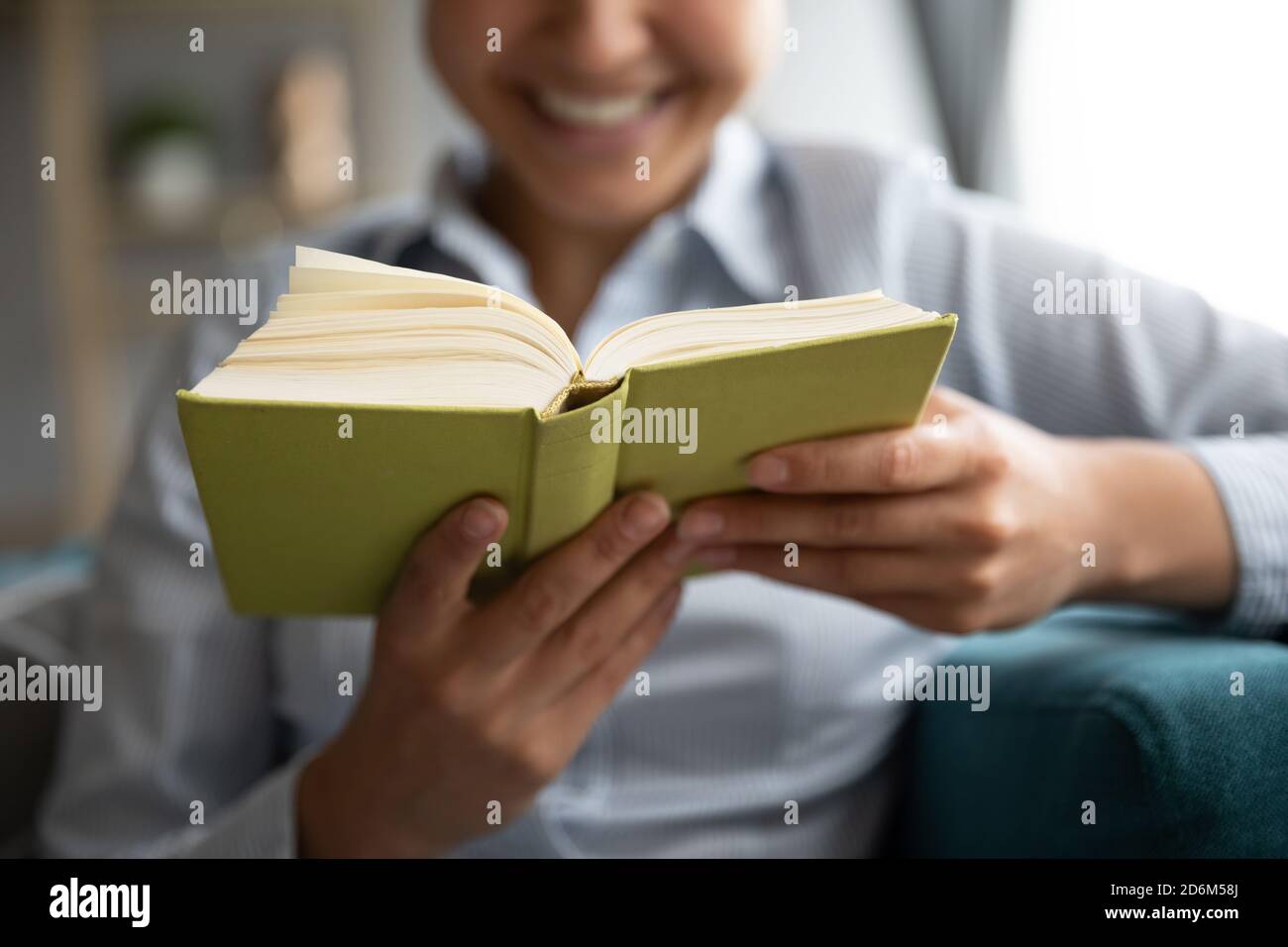 Closeup focus on indian female hands holding book Stock Photo - Alamy