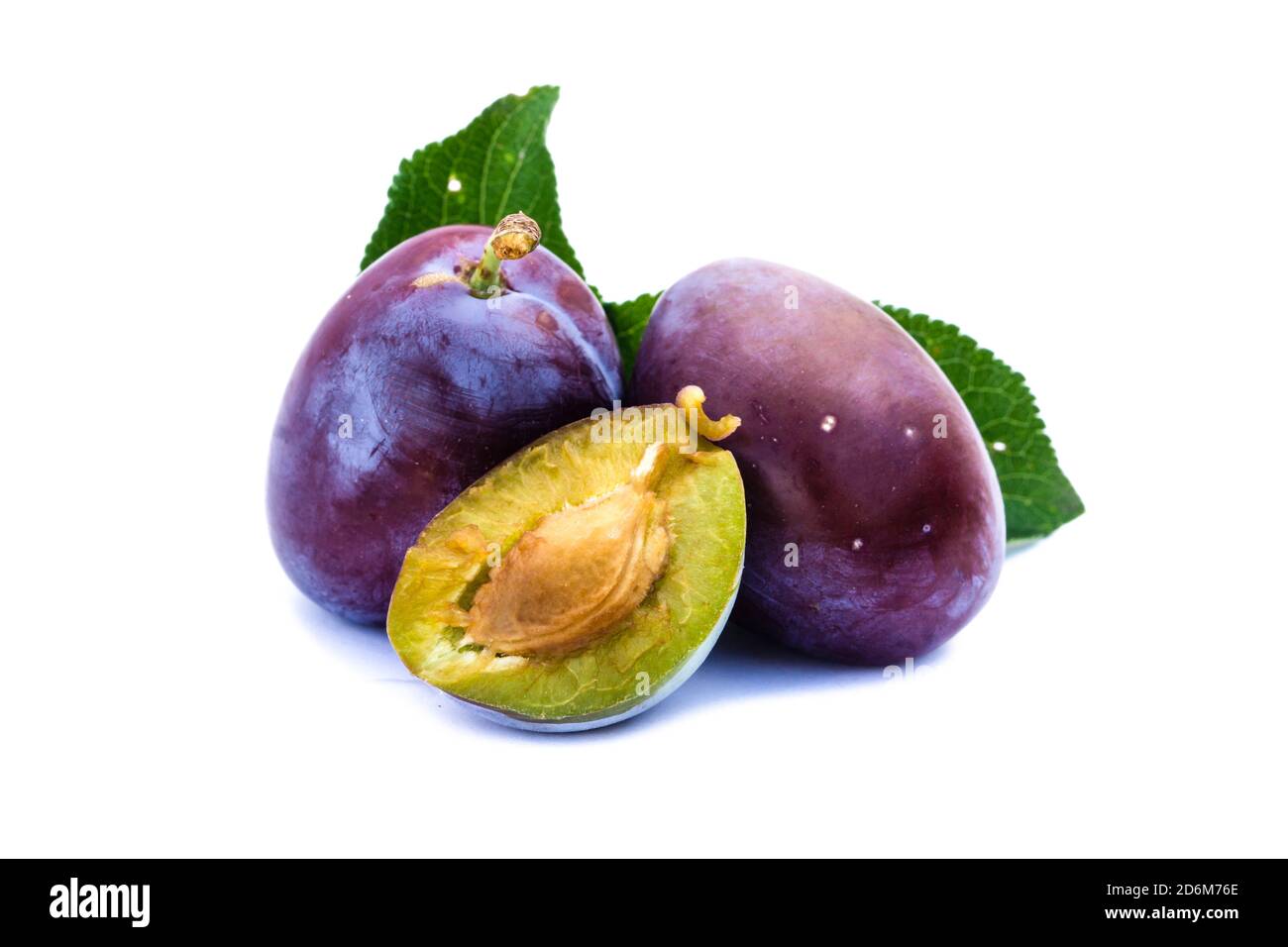 Plums isolated on white background Stock Photo - Alamy