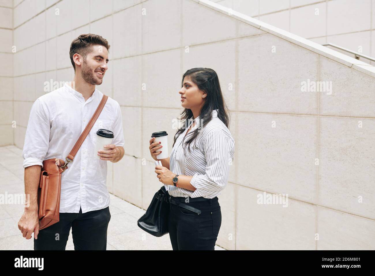 Business people discussing news Stock Photo - Alamy