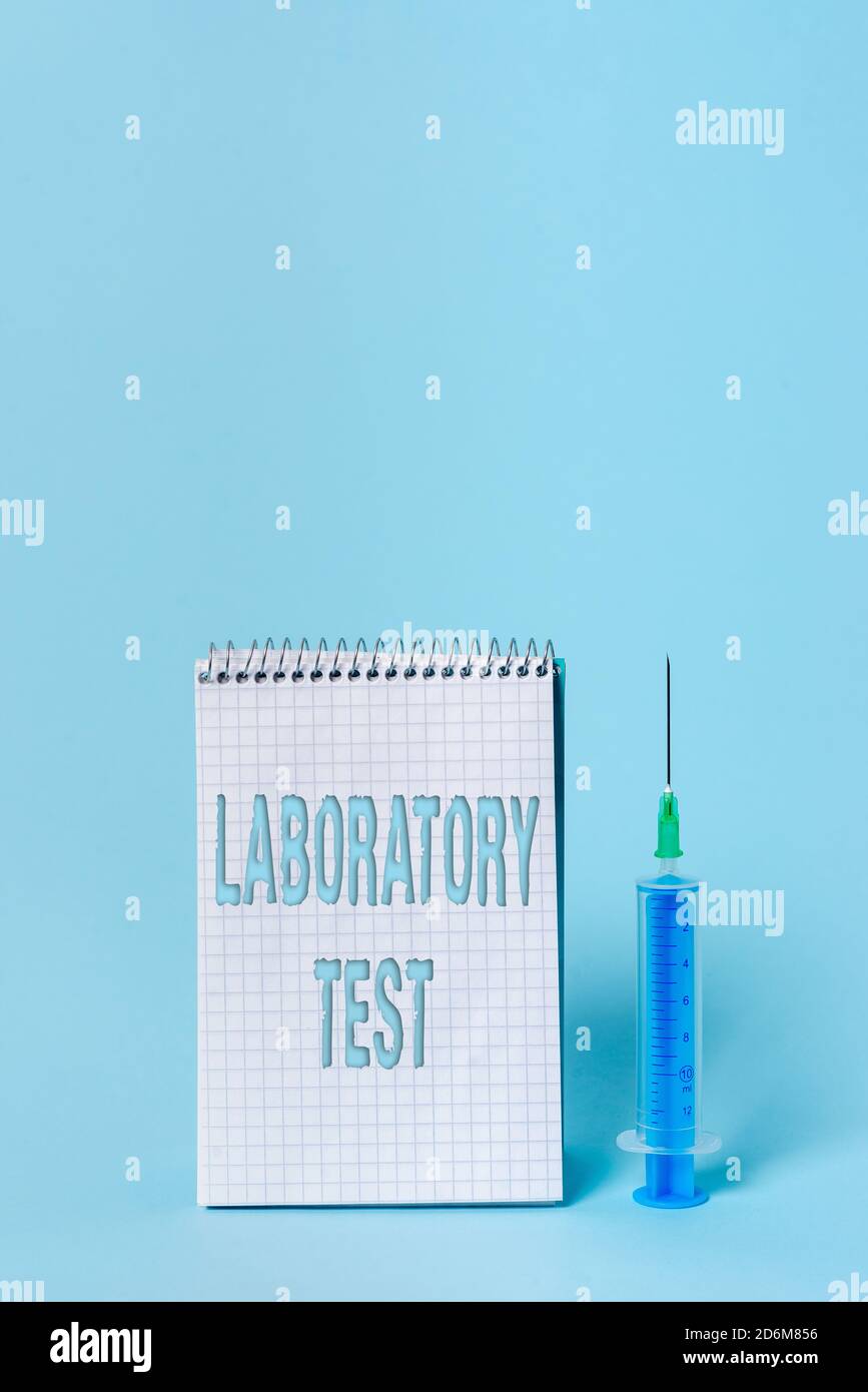 Writing note showing Laboratory Test. Business concept for ...