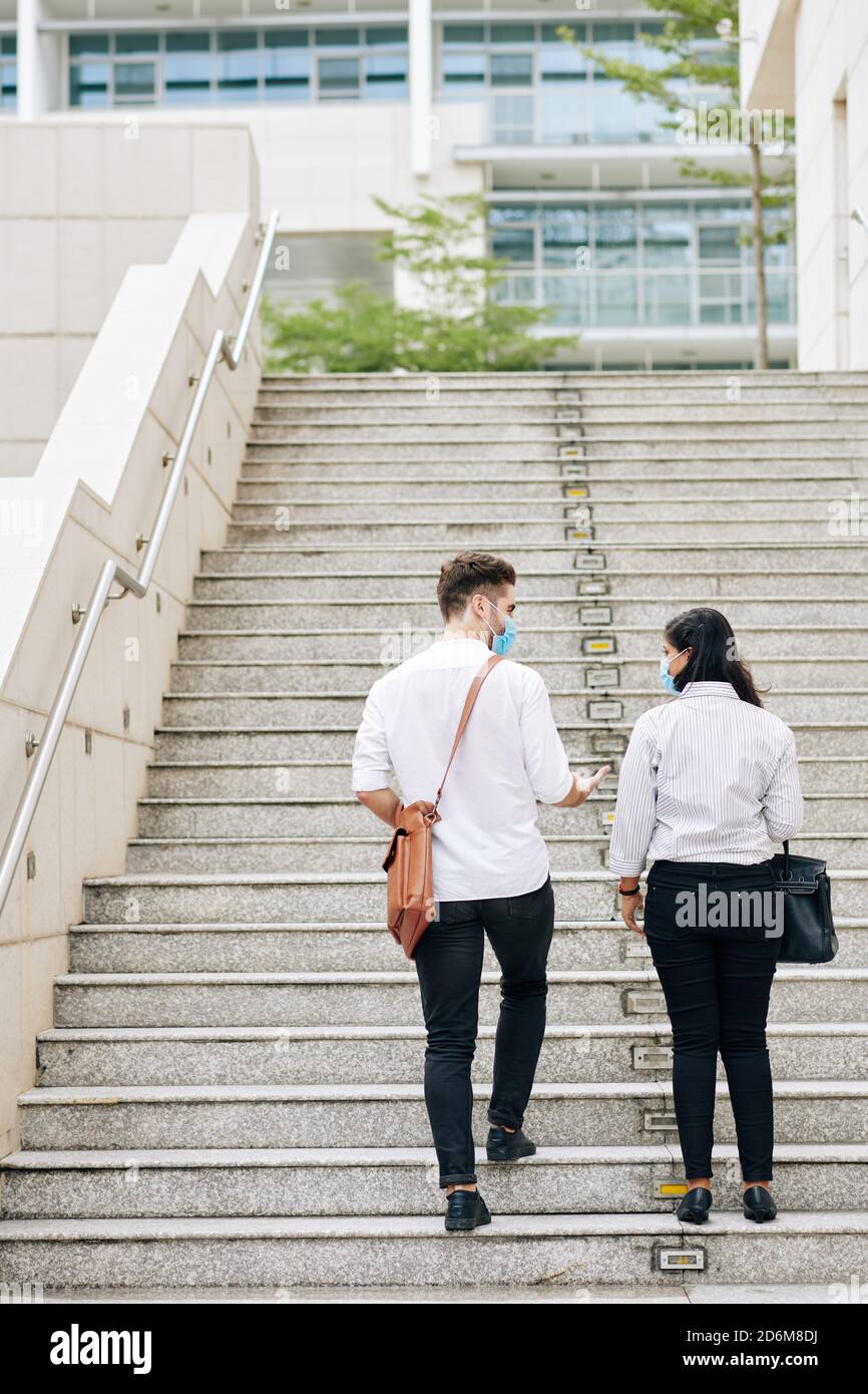 Business people walking to office Stock Photo - Alamy