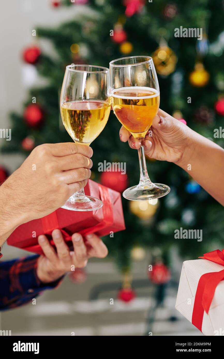 Toasting at Christmas party Stock Photo - Alamy