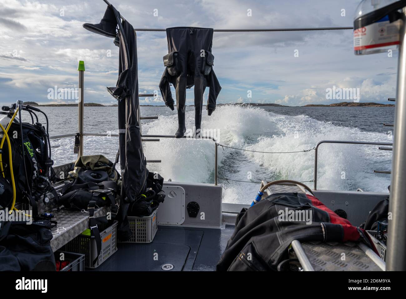 A beautiful view from the stern of a speedy dive boat. A hanging scuba ...