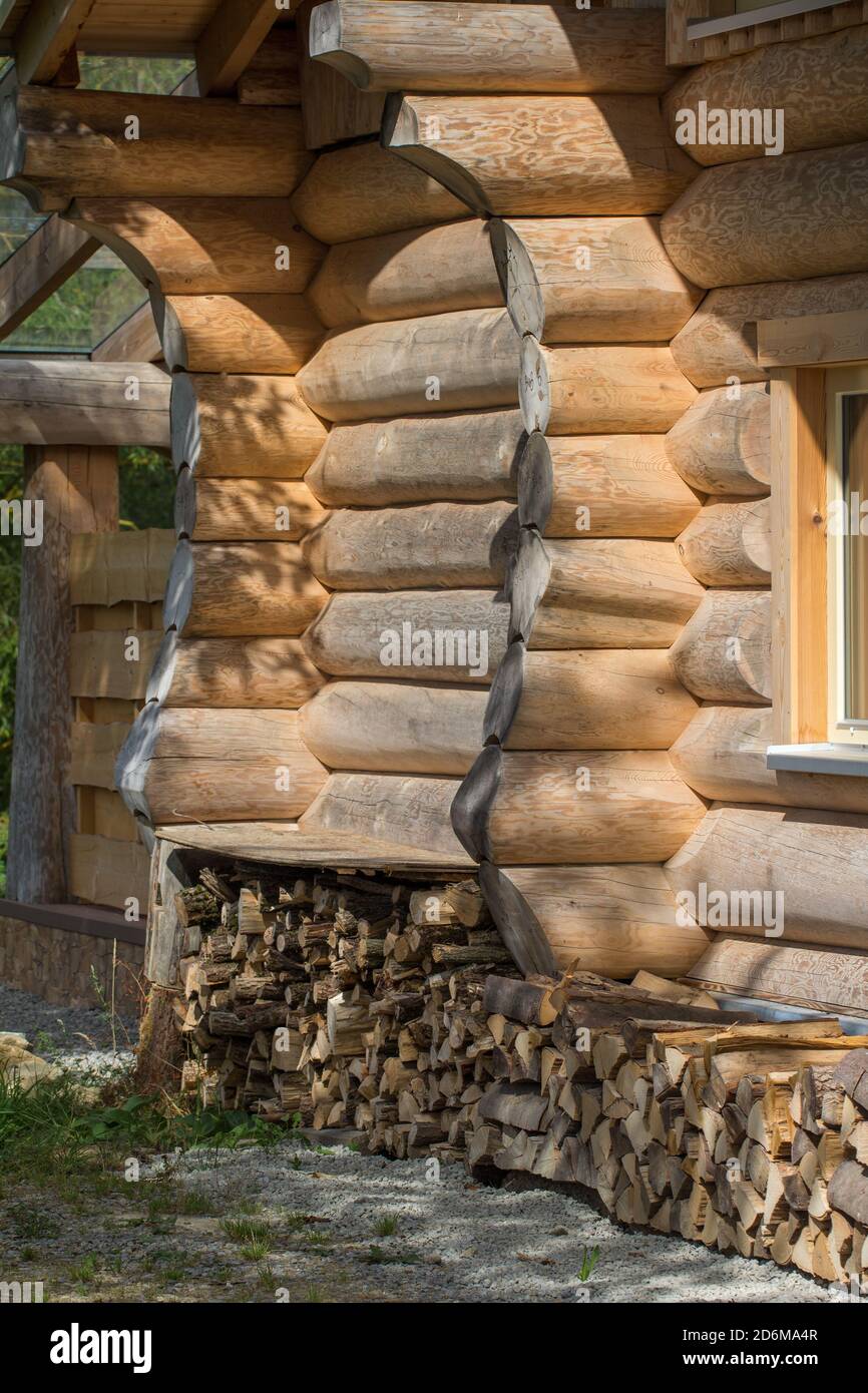 Vertical shot of an exterior of a log cabin during daylight Stock Photo ...