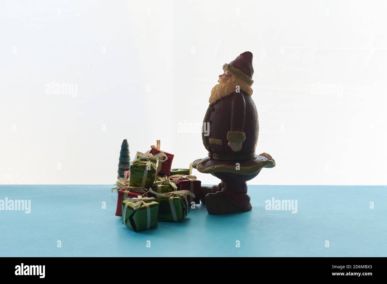 Santa with presents ornament hi-res stock photography and images - Alamy
