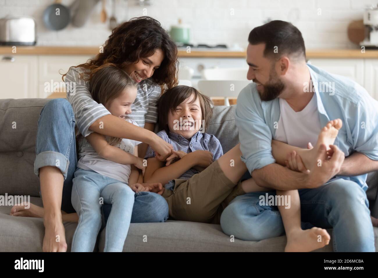 Embrace people son two parents hi-res stock photography and images - Alamy