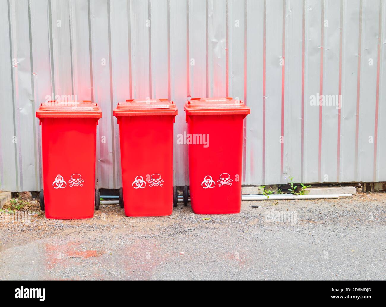 red bins three with symbol infectious in the outdoors keep clean from ...