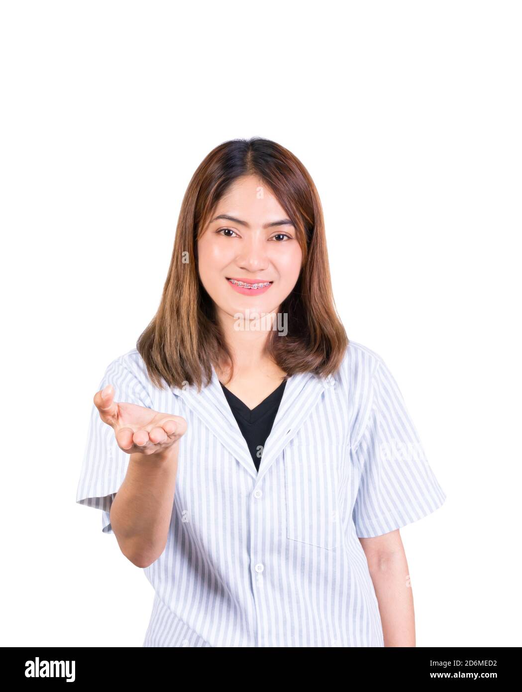 woman showing open hand for product or something portrait on white ...