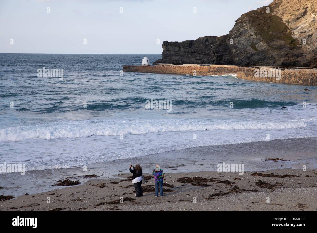 People on the beach in Portreath, Cornwall, UK Stock Photo - Alamy