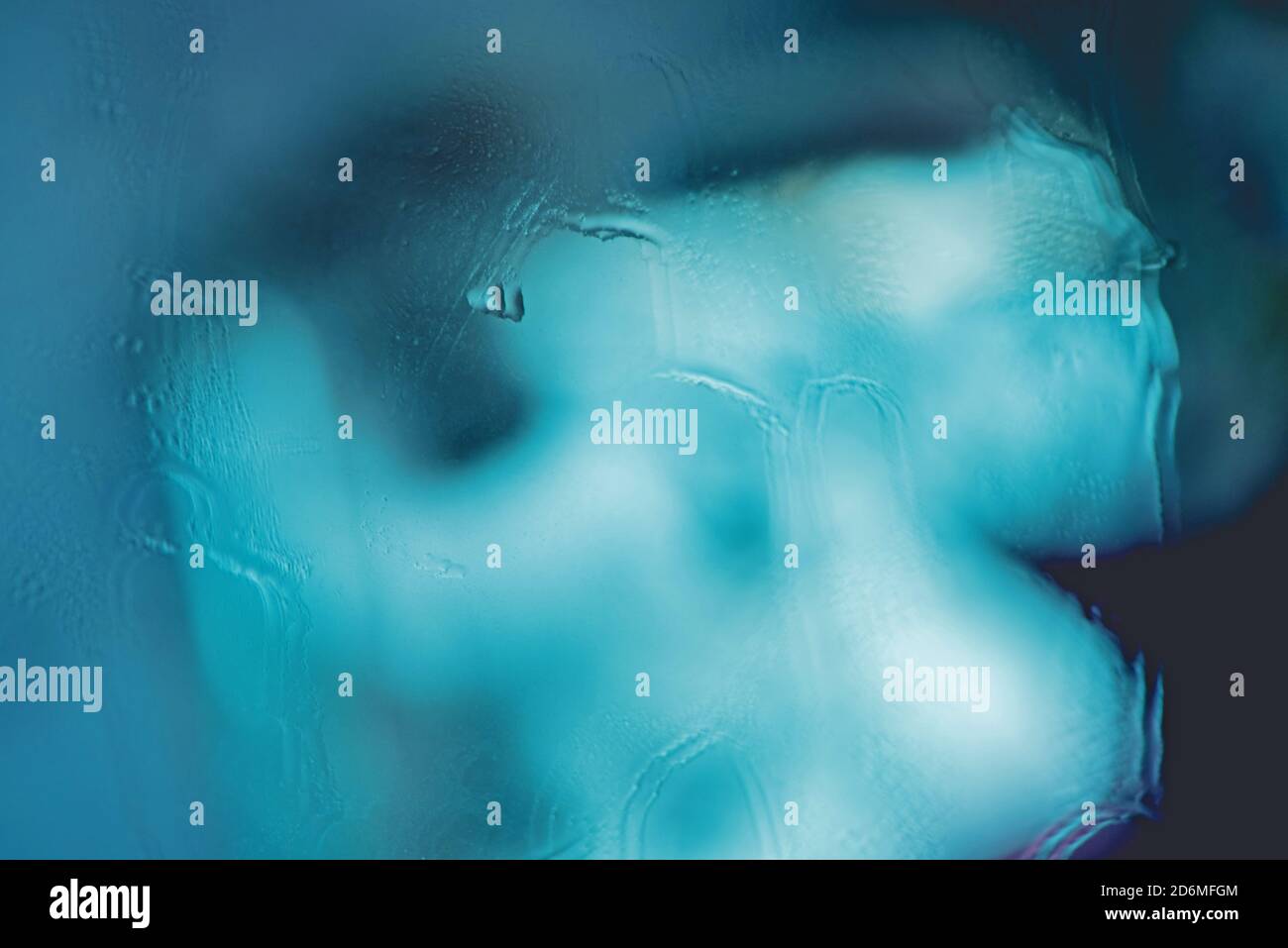 Water flow, drops on a wet mirror. Blurred abstract background Stock ...
