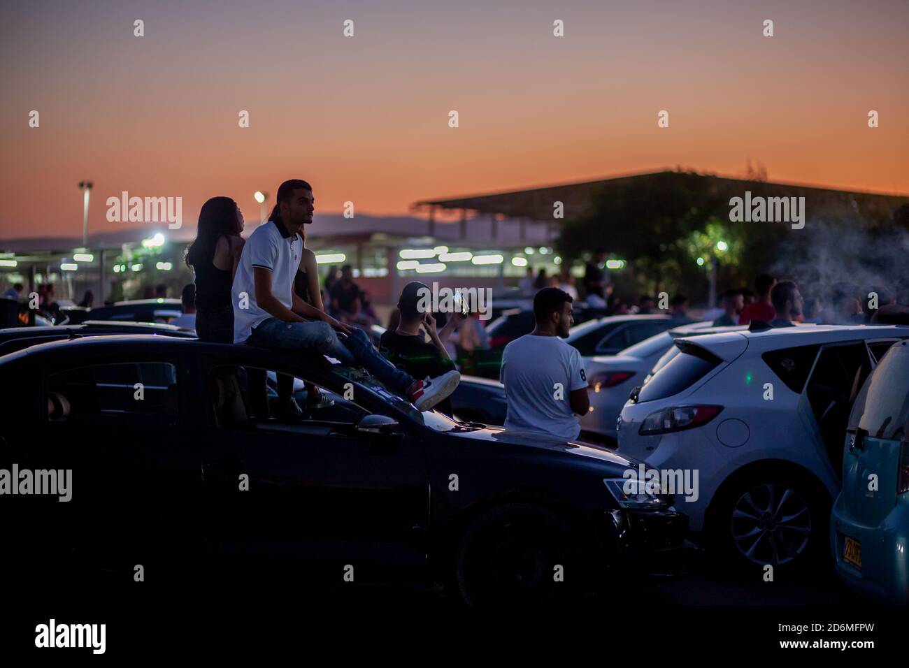 Jericho. 16th Oct, 2020. Palestinians enjoy a moment in a drive-in ...