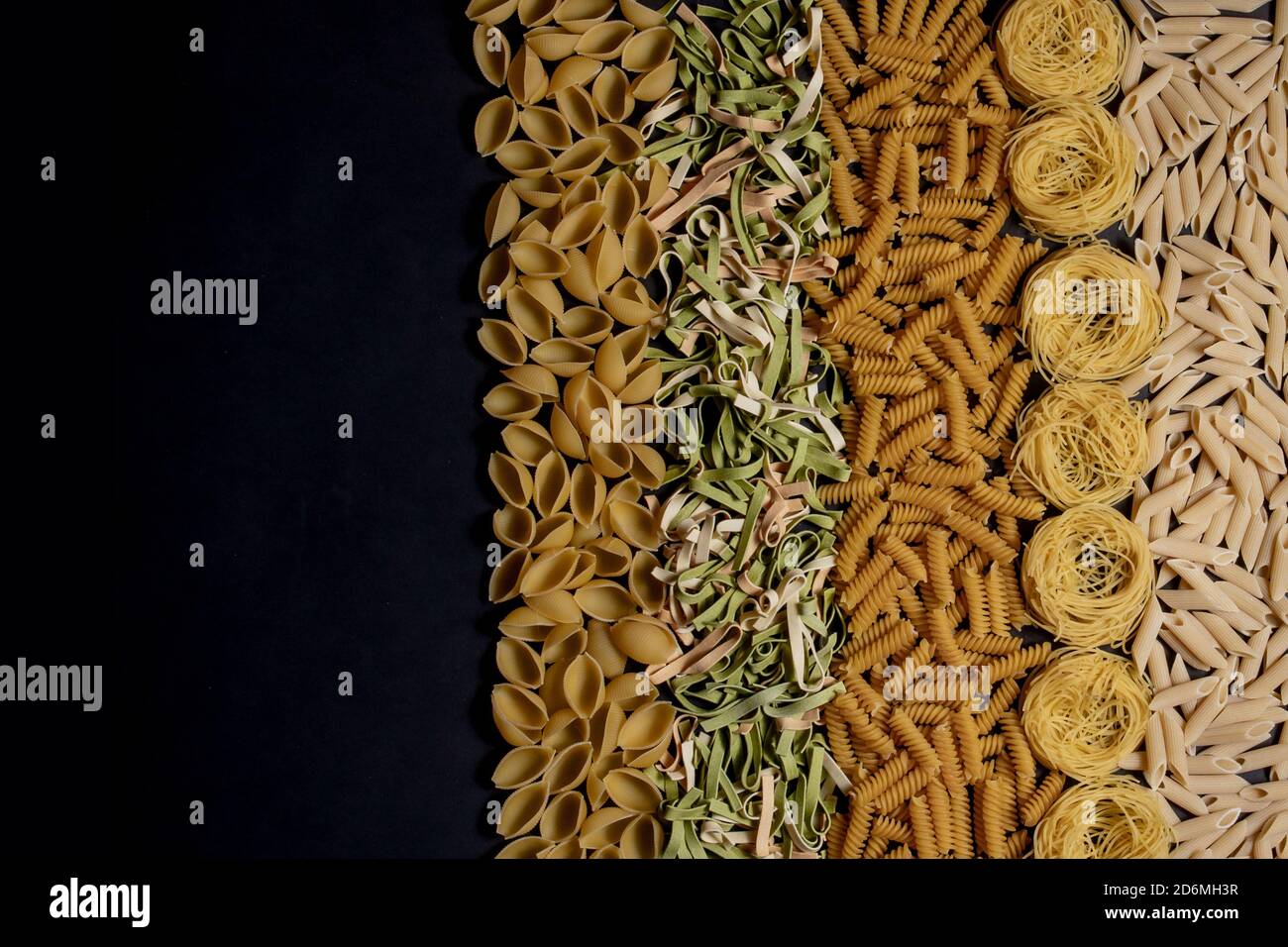 Variety of types and shapes of dry Italian pasta. Italian Macaroni raw ...