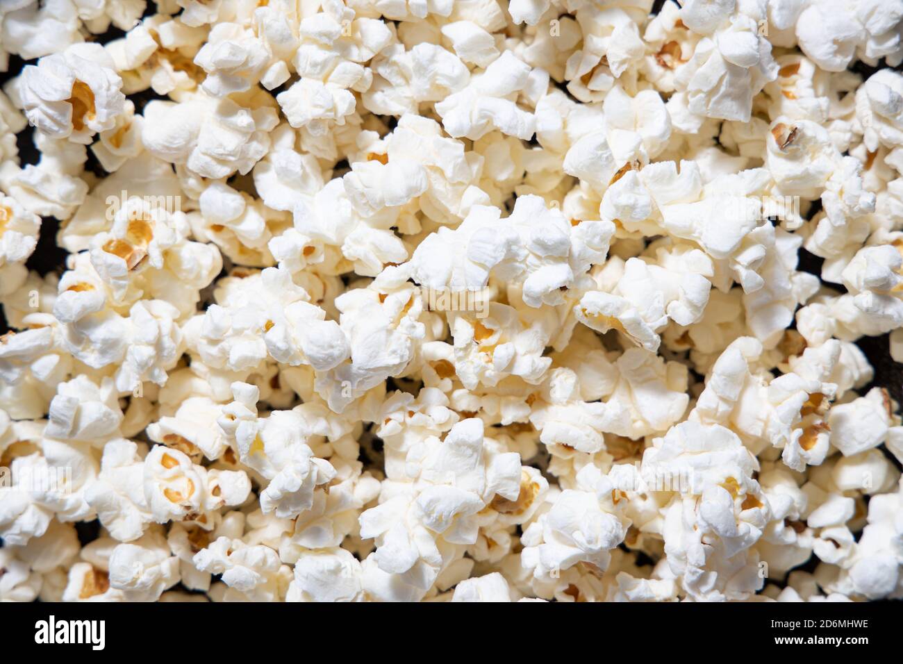 Scattered salted popcorn, texture background Stock Photo - Alamy