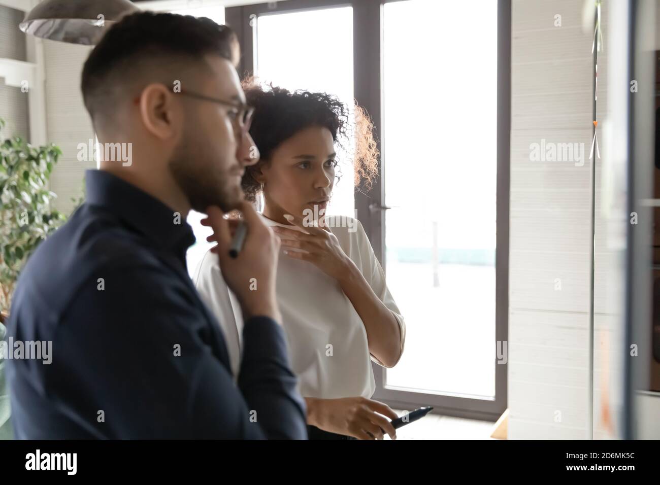 Focused executive thinking task solution hi-res stock photography and ...