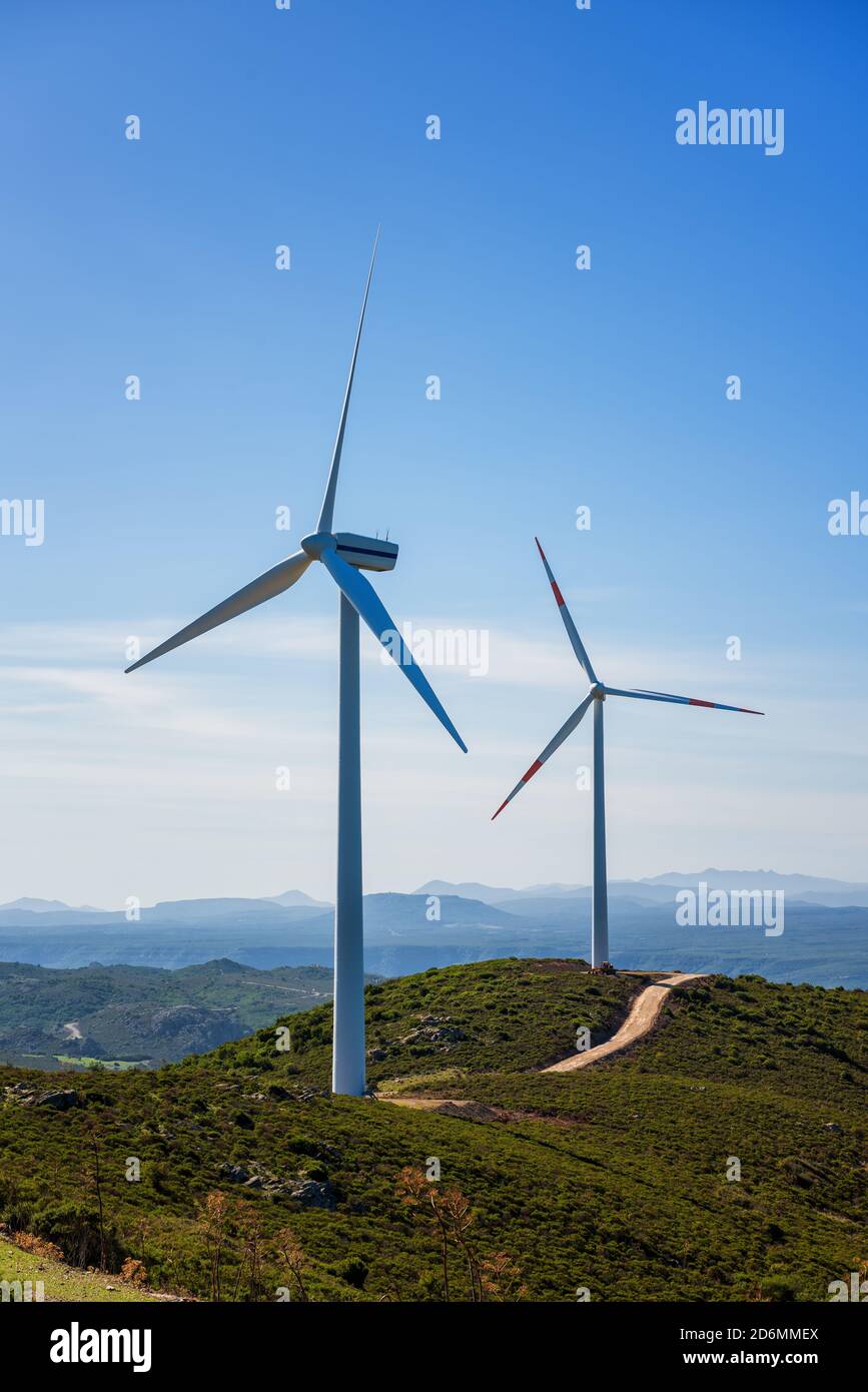 Wind turbines on a beautiful blue sky in a mountain wind farm in ...
