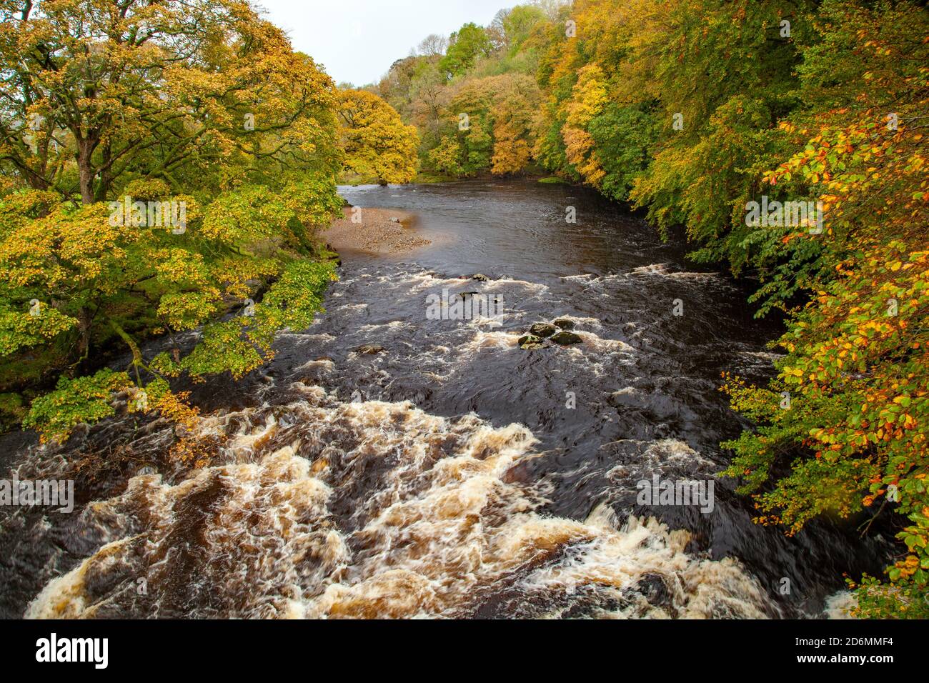 The river Lune in full flow during Autumn in the Yorkshire Dales ...