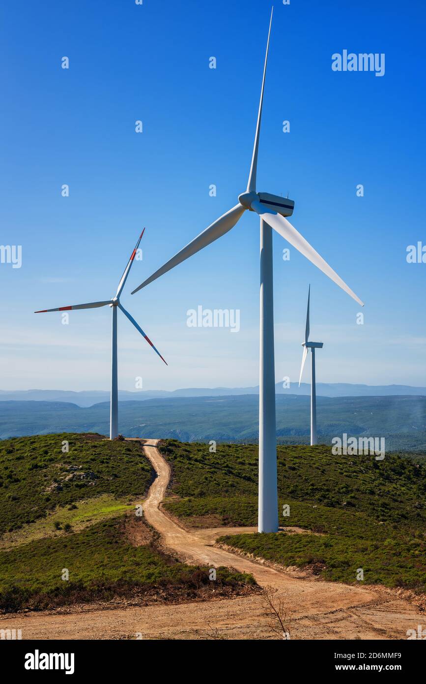 Wind turbines on a beautiful blue sky in a mountain wind farm in ...