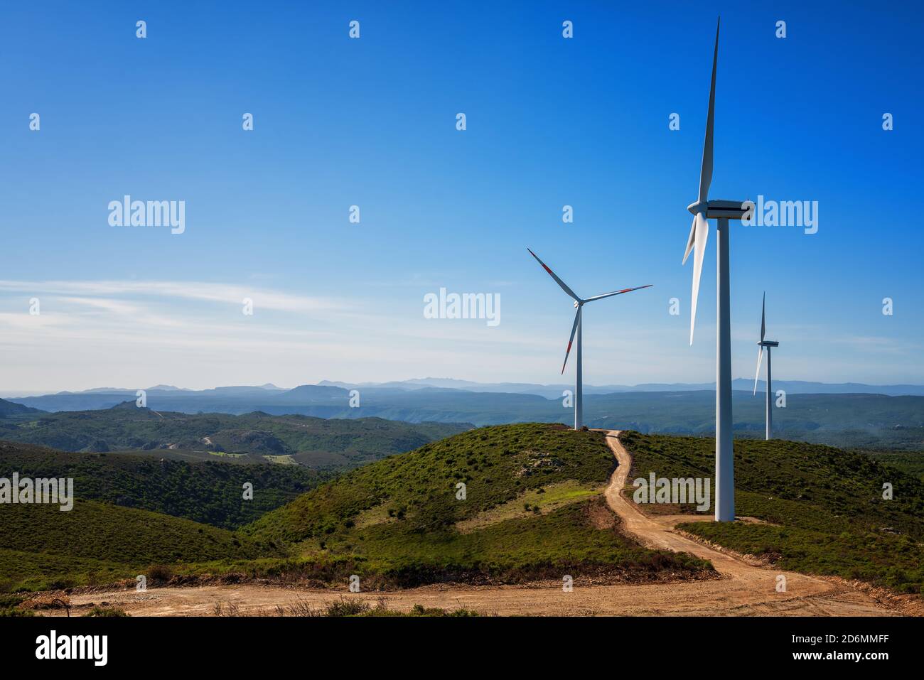 Wind turbines on a beautiful blue sky in a mountain wind farm in ...
