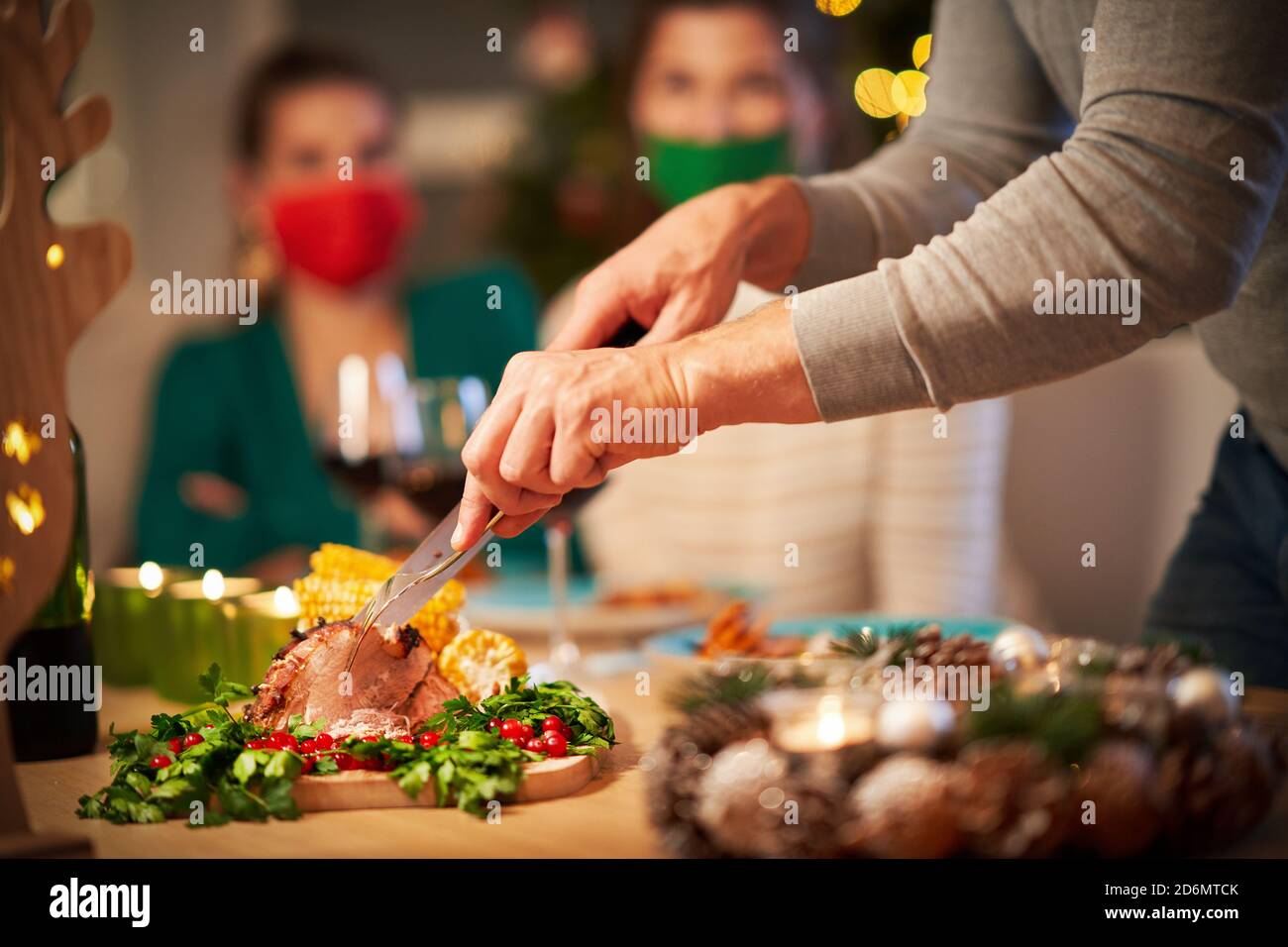Christmas ham being served on the table Stock Photo - Alamy