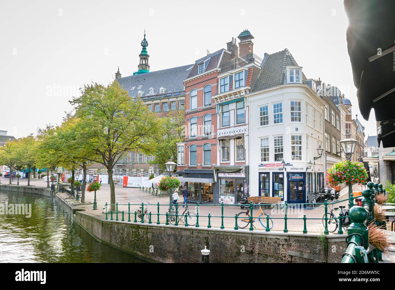 Tall traditional houses in the historic city of Leiden. The market has ...
