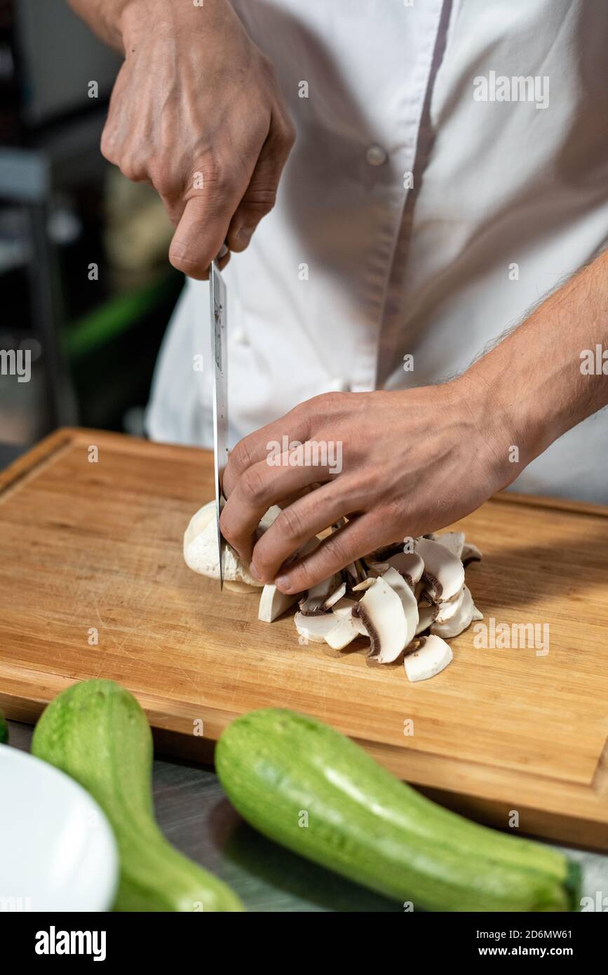 Chef knife cutting hi-res stock photography and images - Alamy