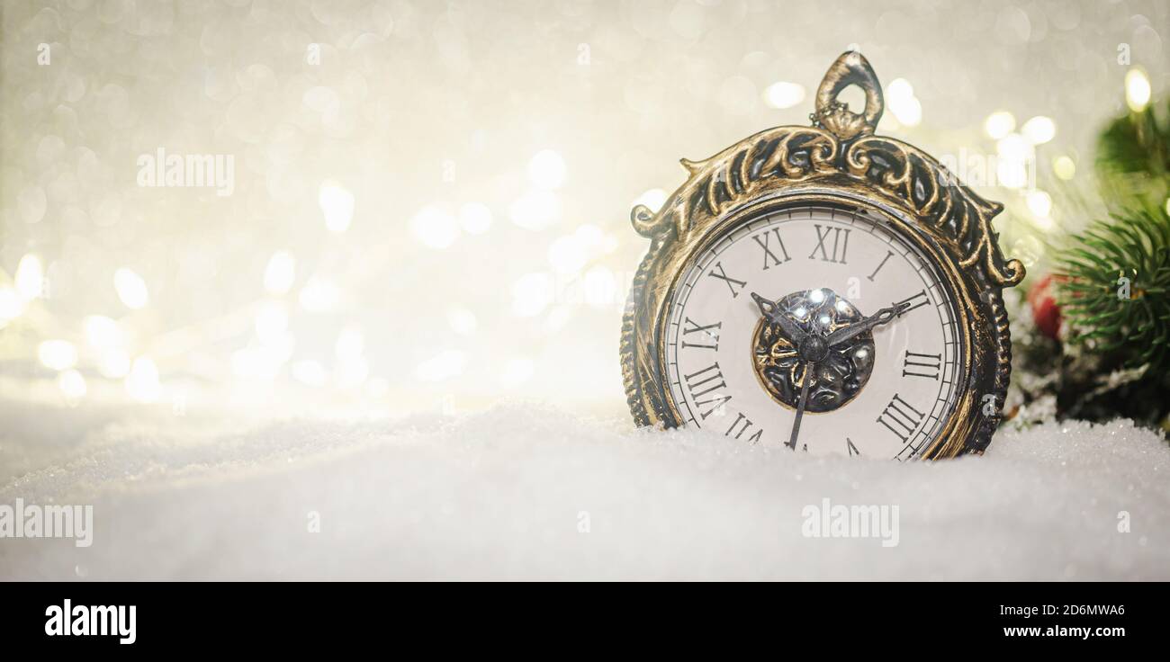 Christmas decoration with clock Stock Photo - Alamy