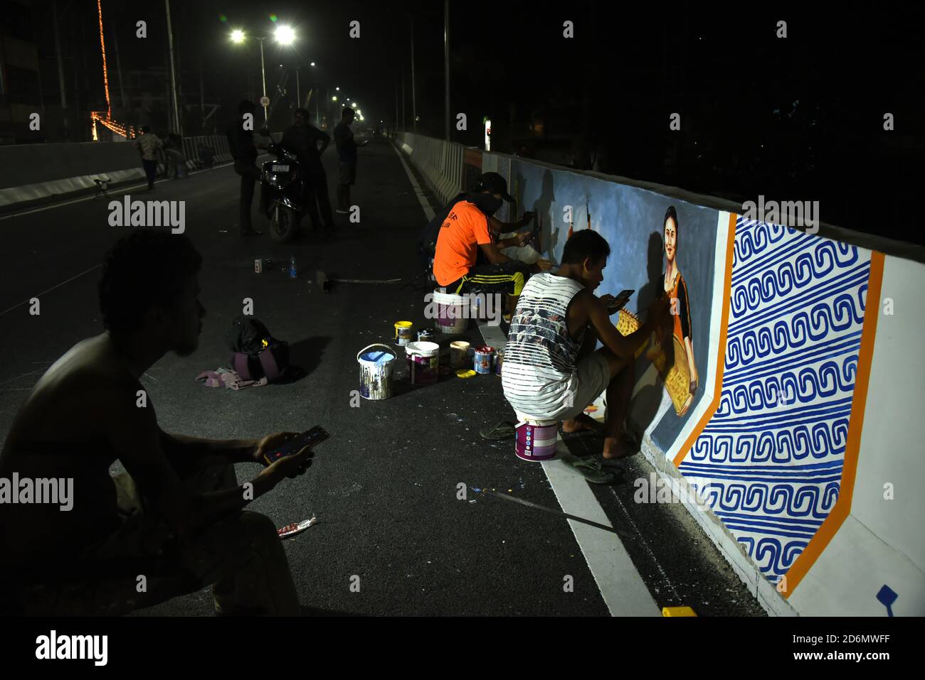 Guwahati, Assam, India. 18th Oct, 2020. Artist paint mural in a newly ...