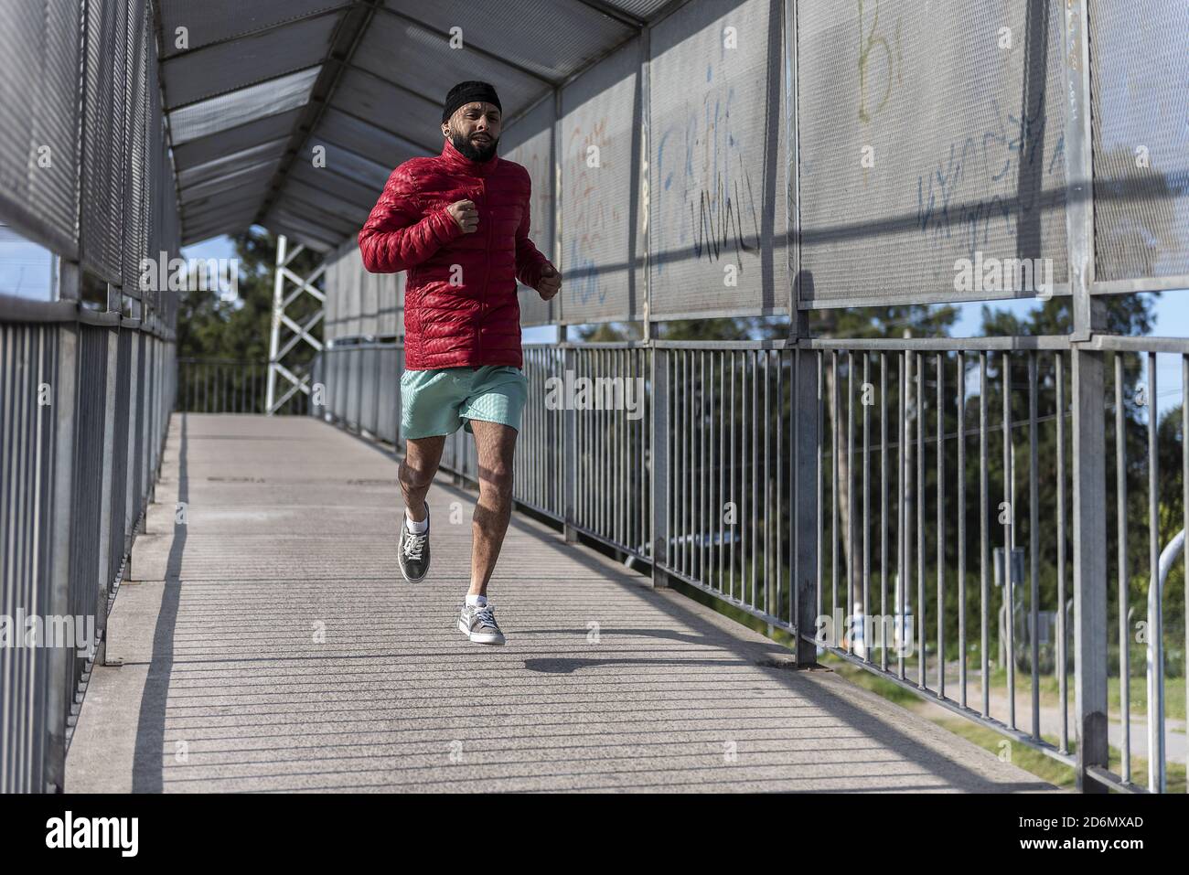 Shot of a running man in the street Stock Photo - Alamy