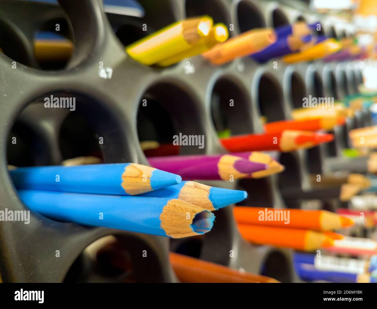 Pencils of different colors in a display Stock Photo - Alamy