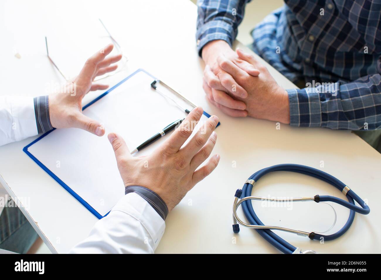 Doctor tells the patient about his illness and the possibilities of his ...