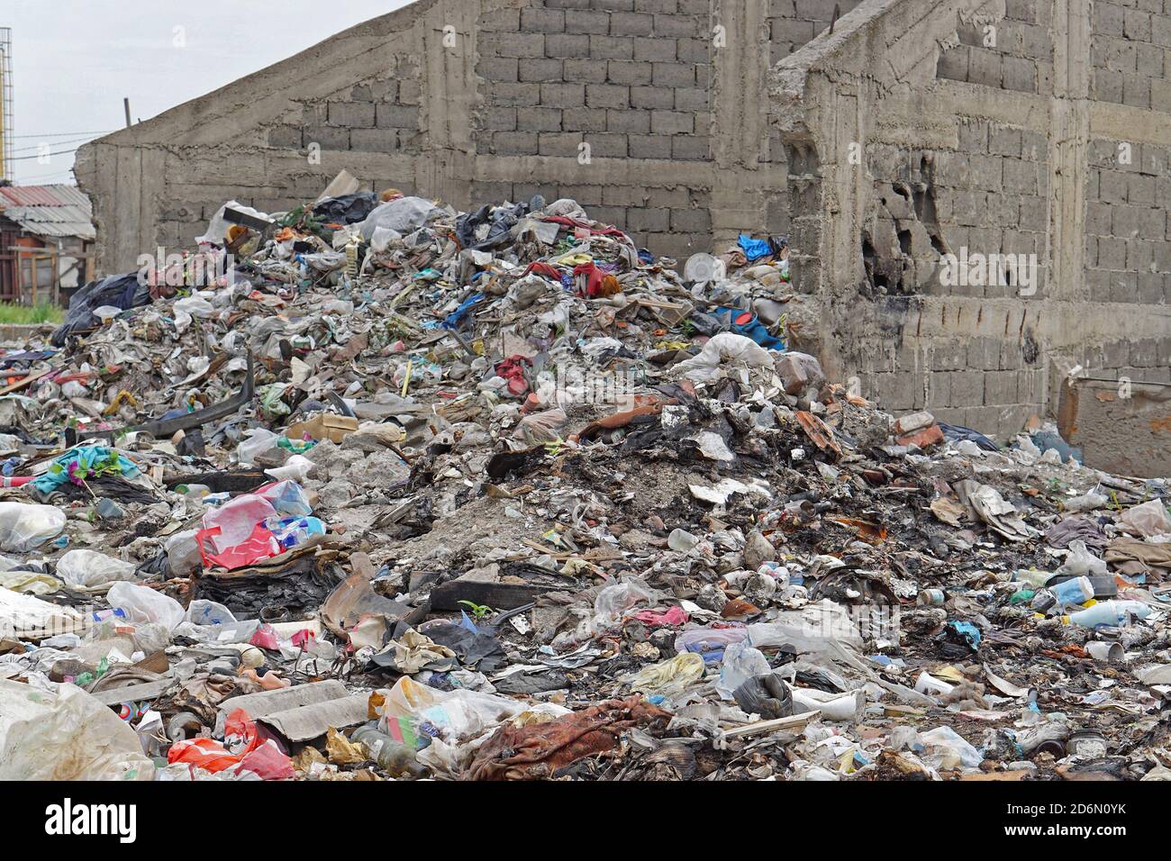 Illegal garbage trash dump site in city Stock Photo - Alamy