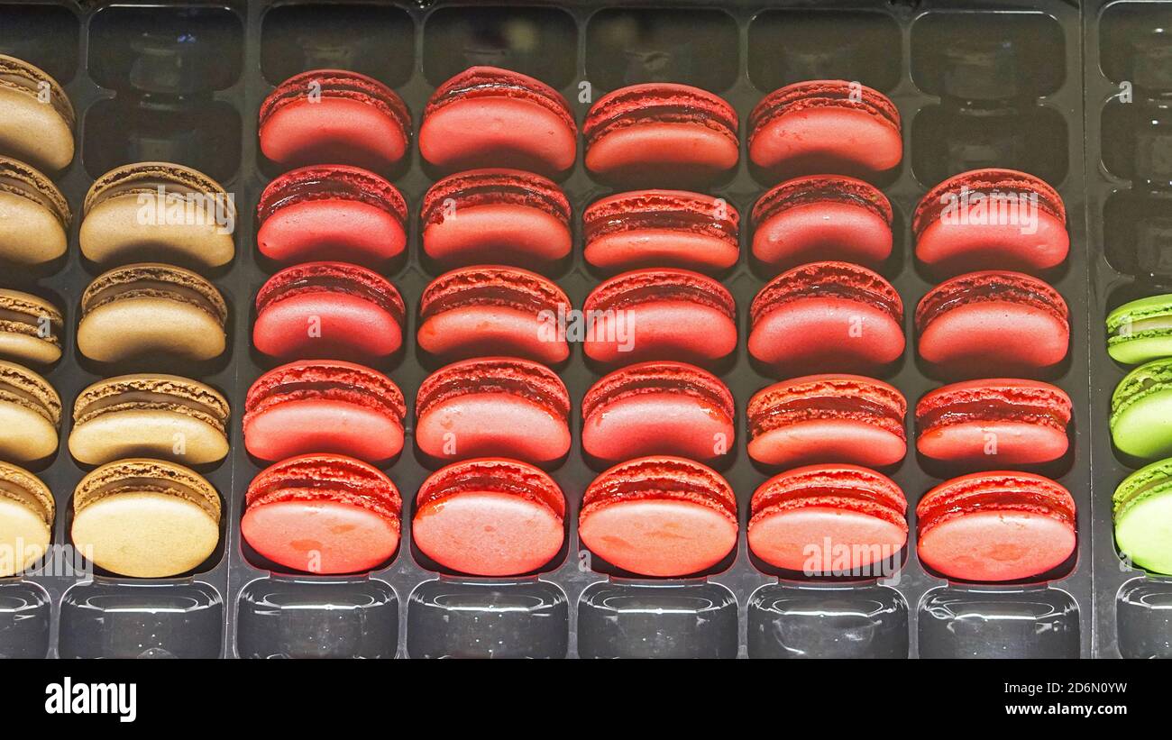 Famous french cuisine macaroons cookies in trays Stock Photo - Alamy