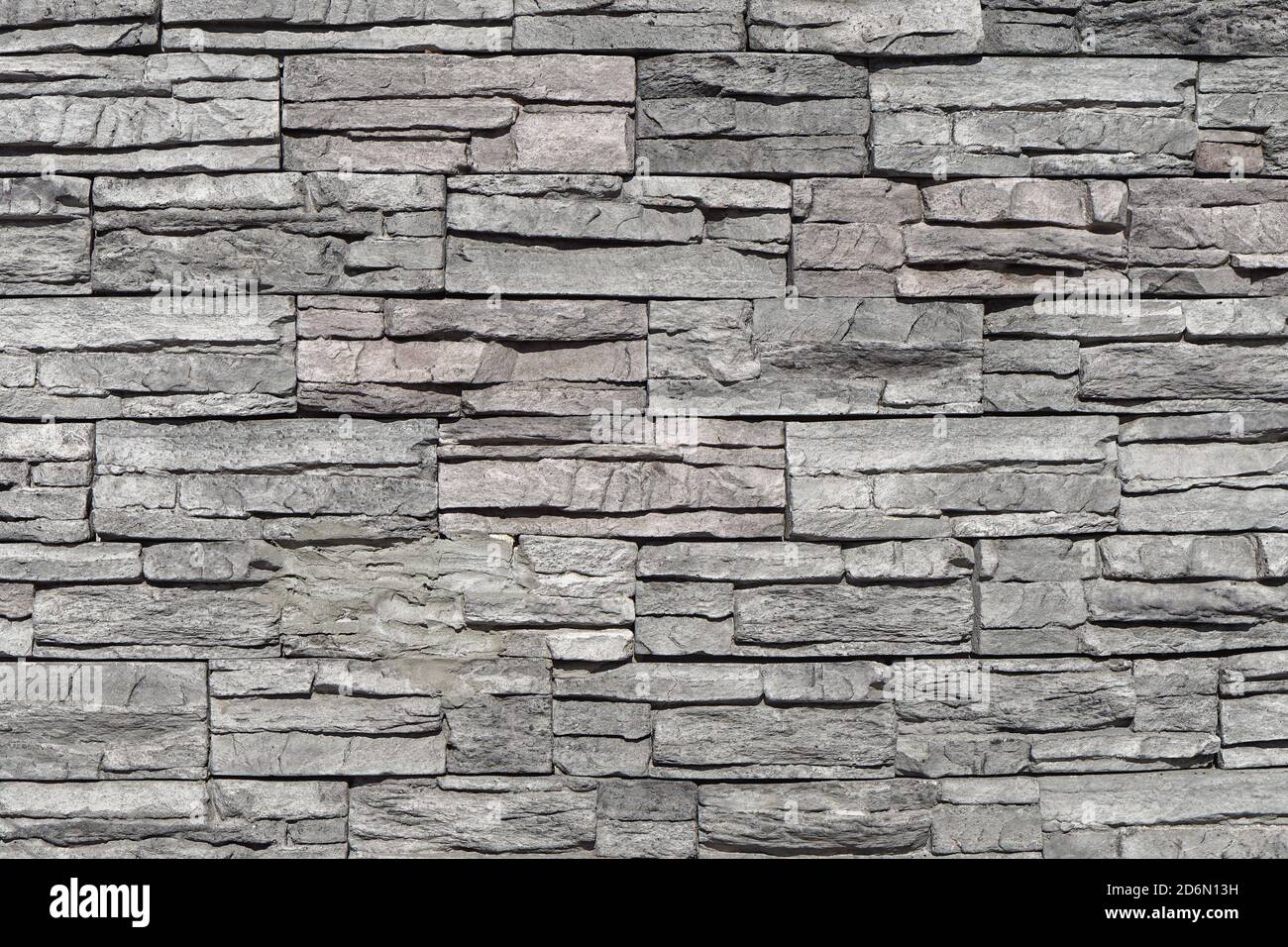 Gray stones tile with rough surface at house wall Stock Photo - Alamy