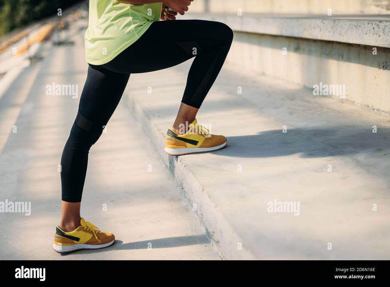Fitness woman doing sport exercises on steps Stock Photo - Alamy
