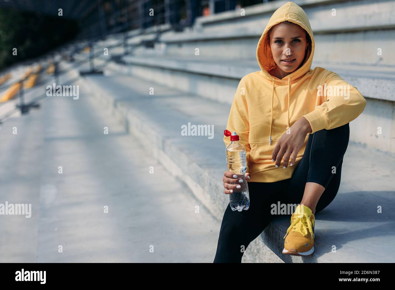 Woman looking camera training water hi-res stock photography and images ...