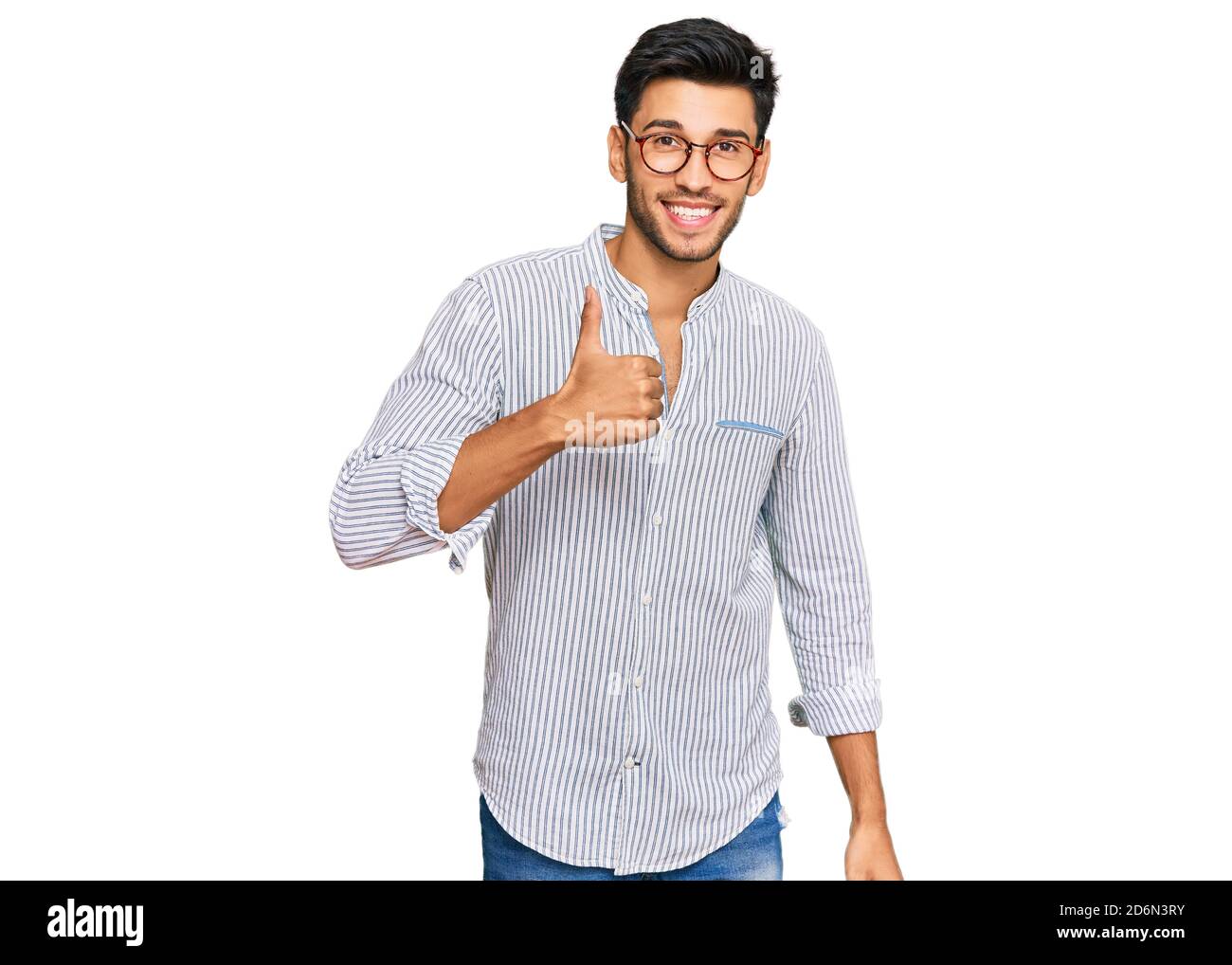 Young handsome man wearing casual clothes and glasses doing happy ...