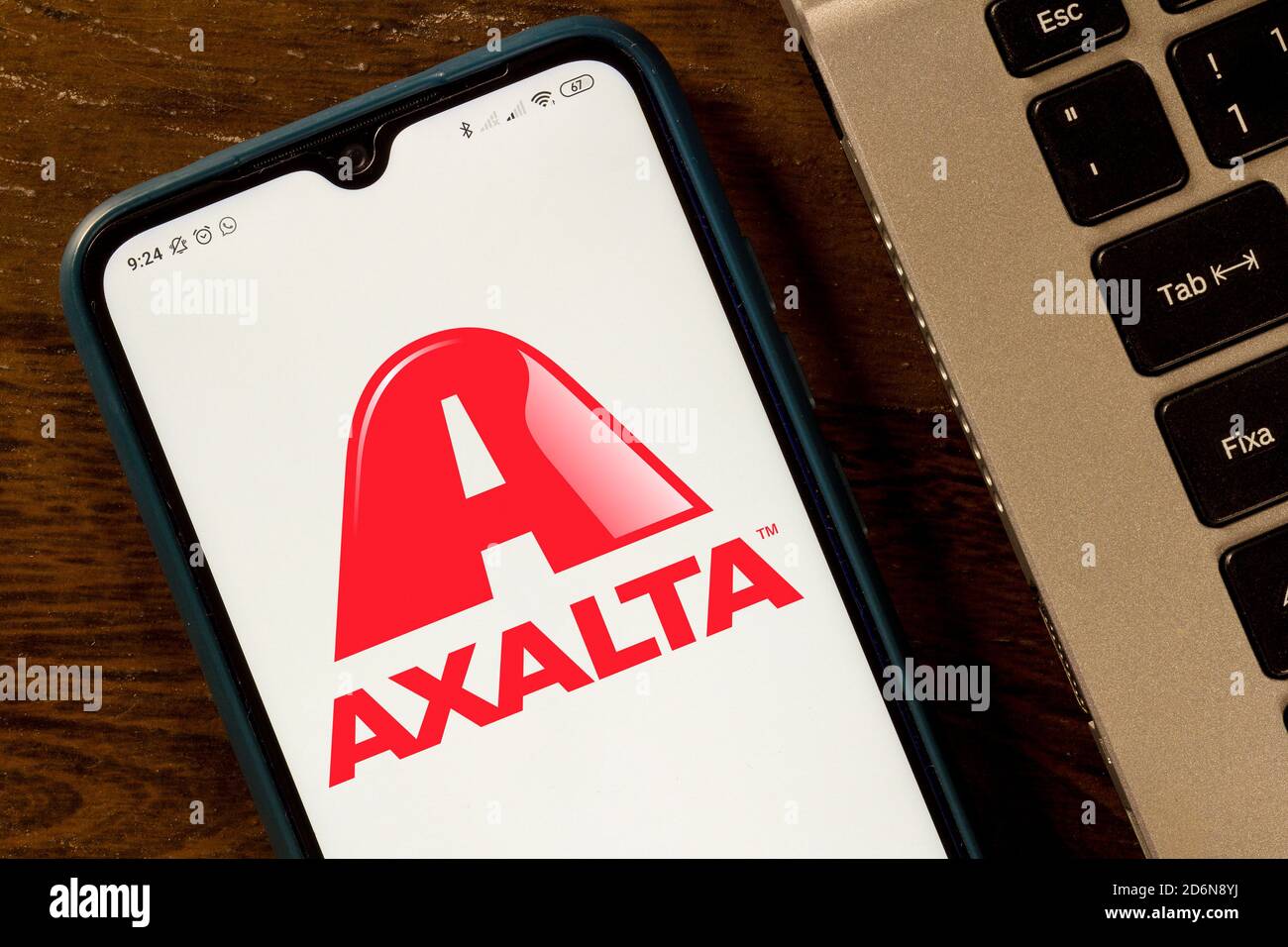 In this photo illustration the Axalta Coating Systems logo seen ...