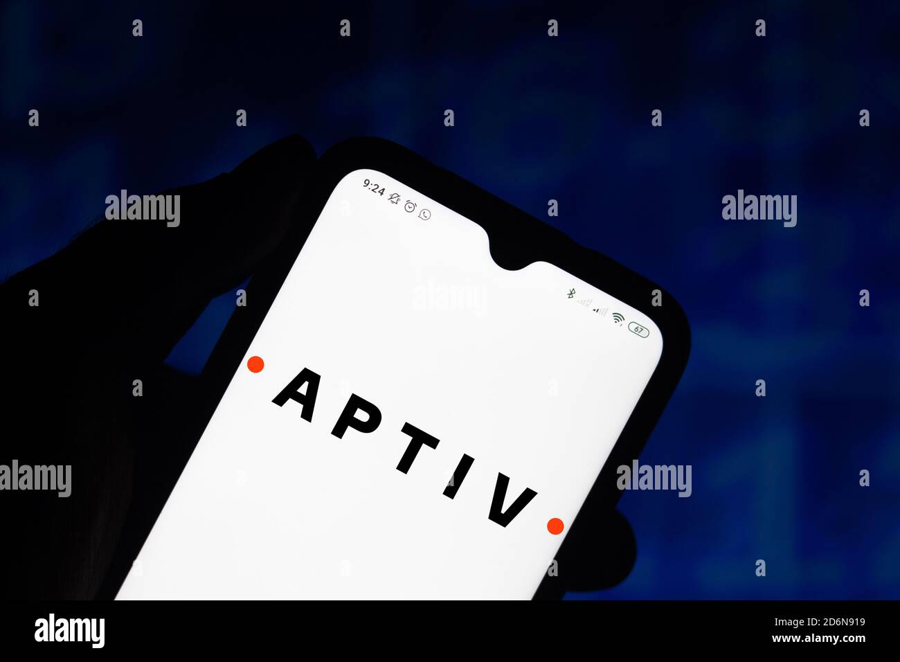 In this photo illustration the APTIV logo seen displayed on a ...
