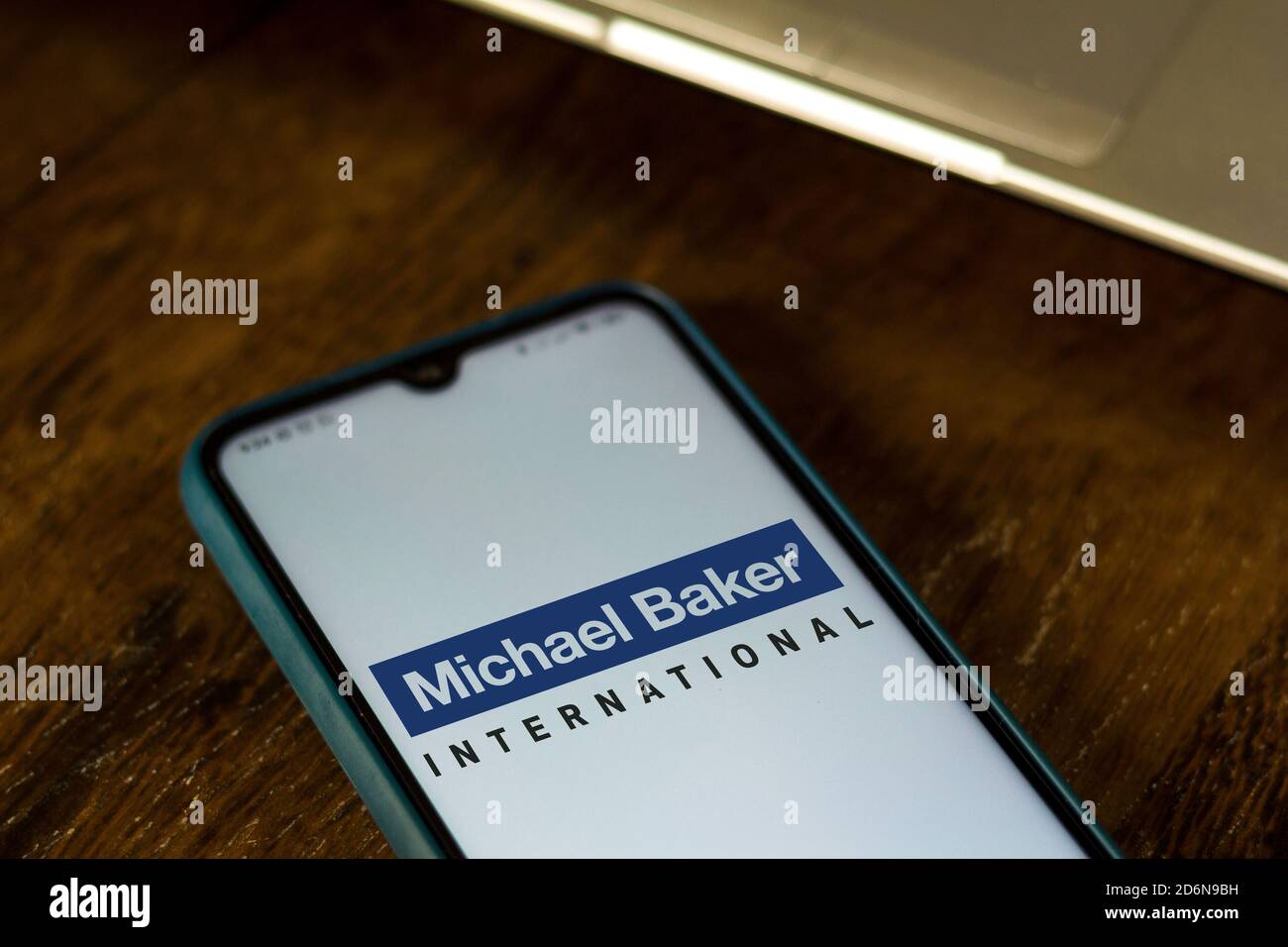 In this photo illustration the Michael Baker International logo seen ...