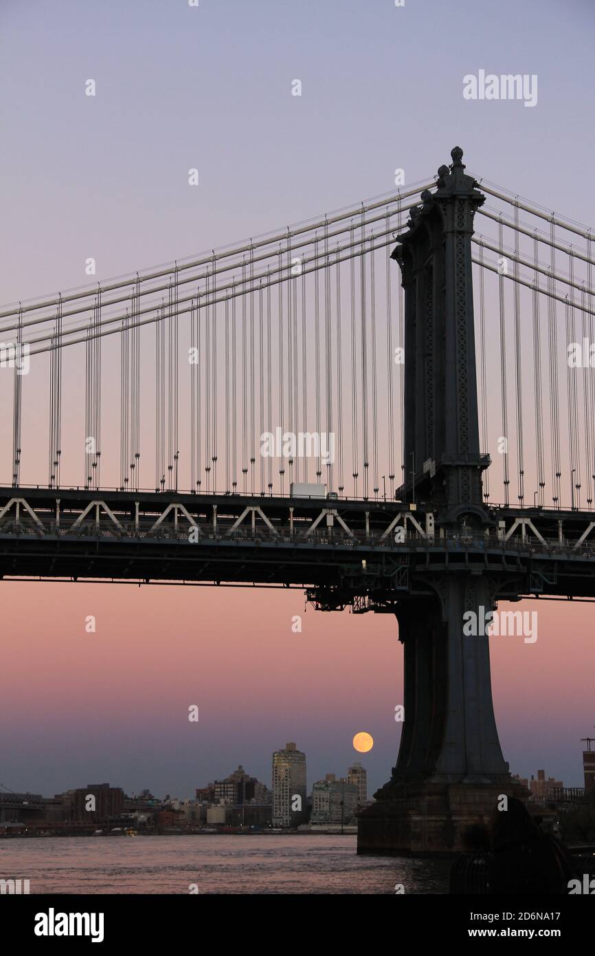 Moon rise under bridge in new york manhattan brooklyn Stock Photo - Alamy