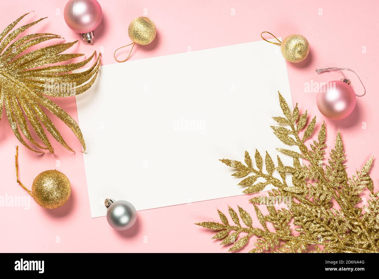 Christmas pink flat lay background with present box and decorations ...