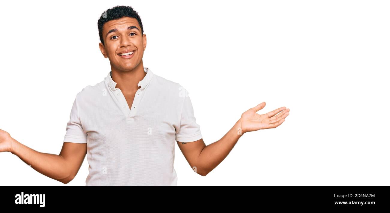 Man showing open palms smiling Cut Out Stock Images & Pictures - Alamy