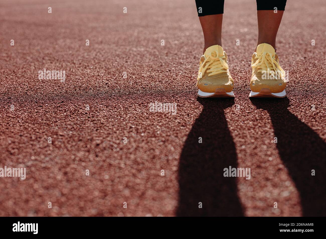 Female athlete standing stadium hi-res stock photography and images - Alamy