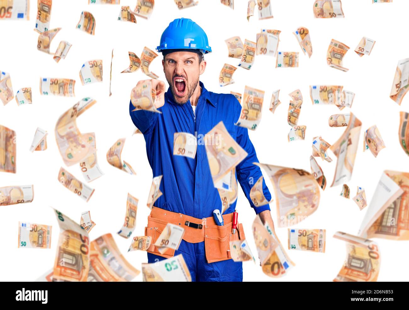 Young handsome man wearing worker uniform and hardhat angry and mad ...
