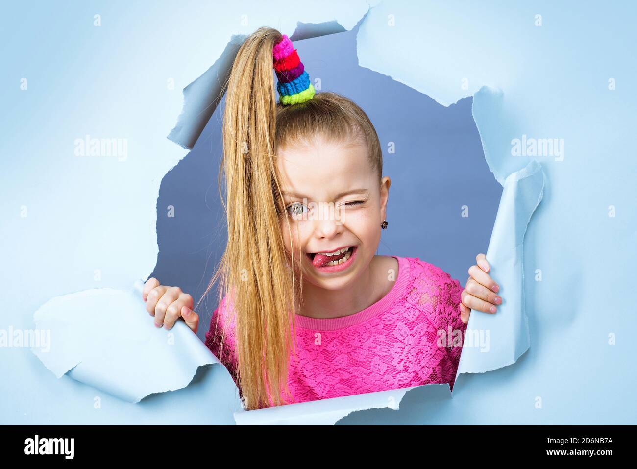 Winking child hi-res stock photography and images - Alamy