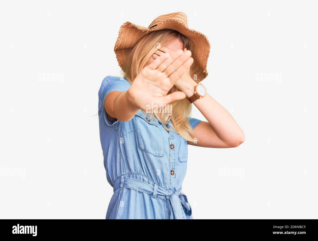 Woman embarrassed beach hi-res stock photography and images - Alamy