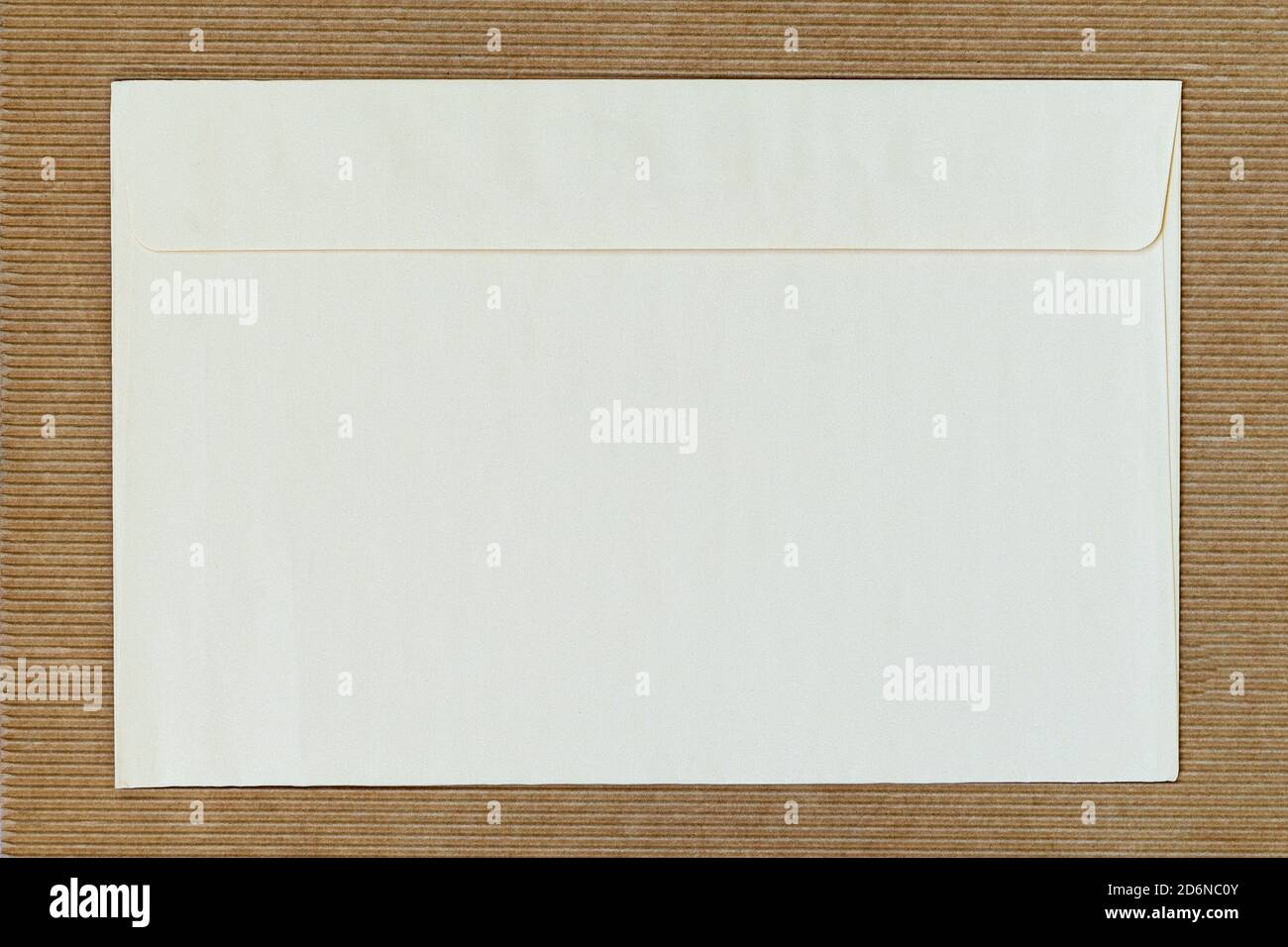 Single light envelope, back side, for background. Paper texture. With ...