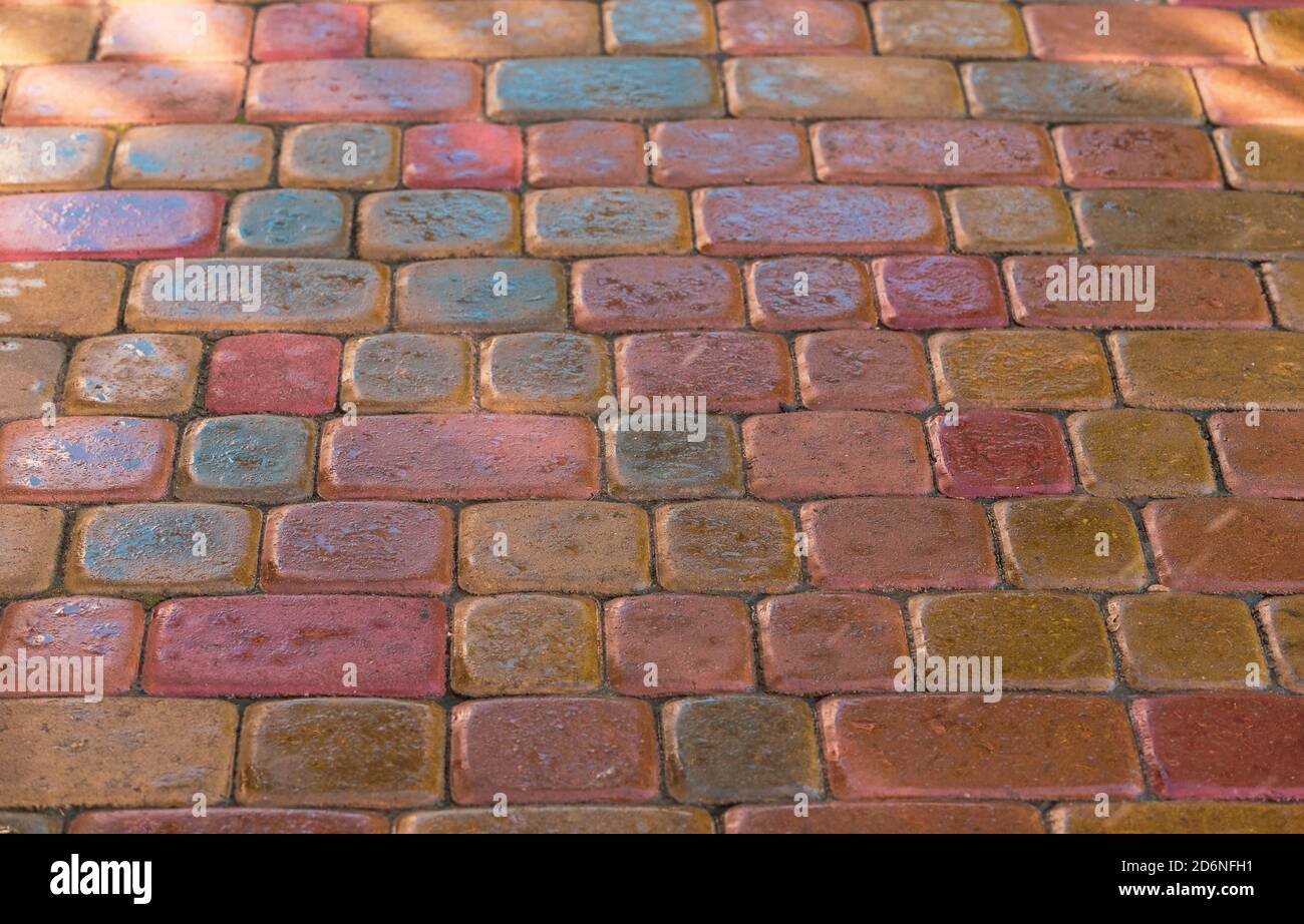 pink paving slab after rain for background Stock Photo - Alamy