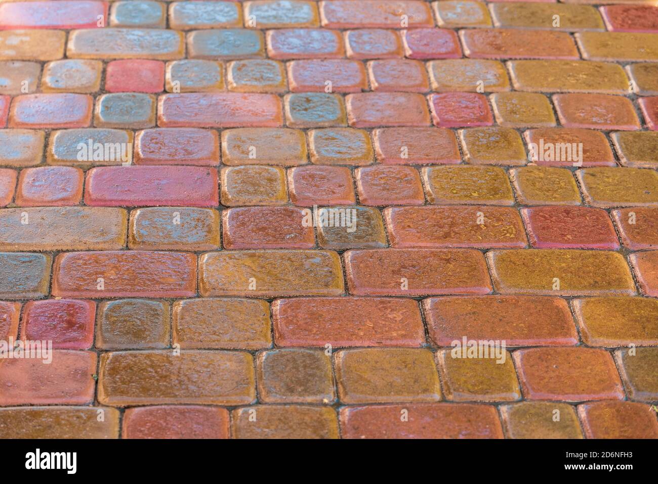 pink paving slab after rain for background Stock Photo - Alamy